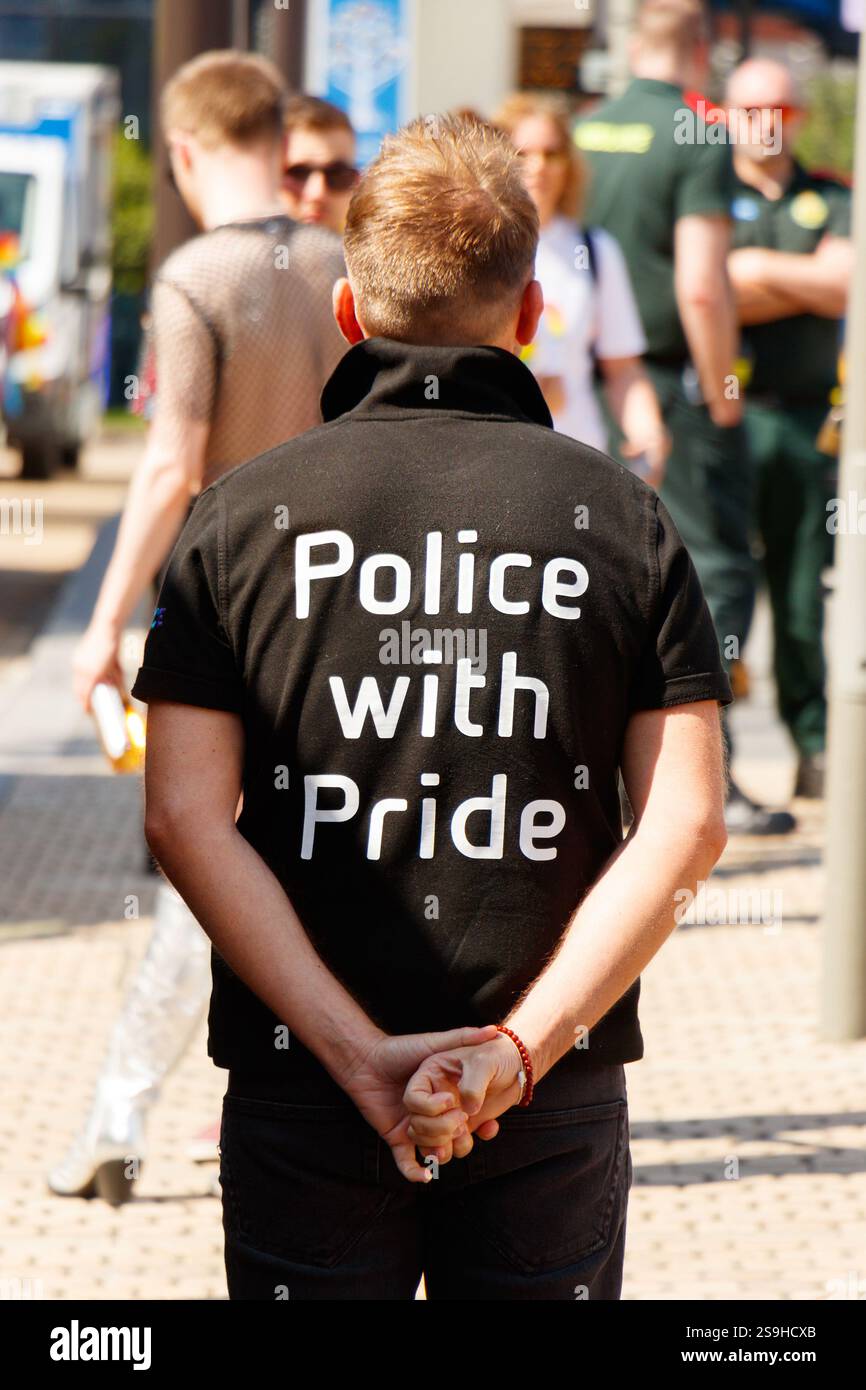 man wearing black T shirt "police with Pride" at Birmingham Pride ...