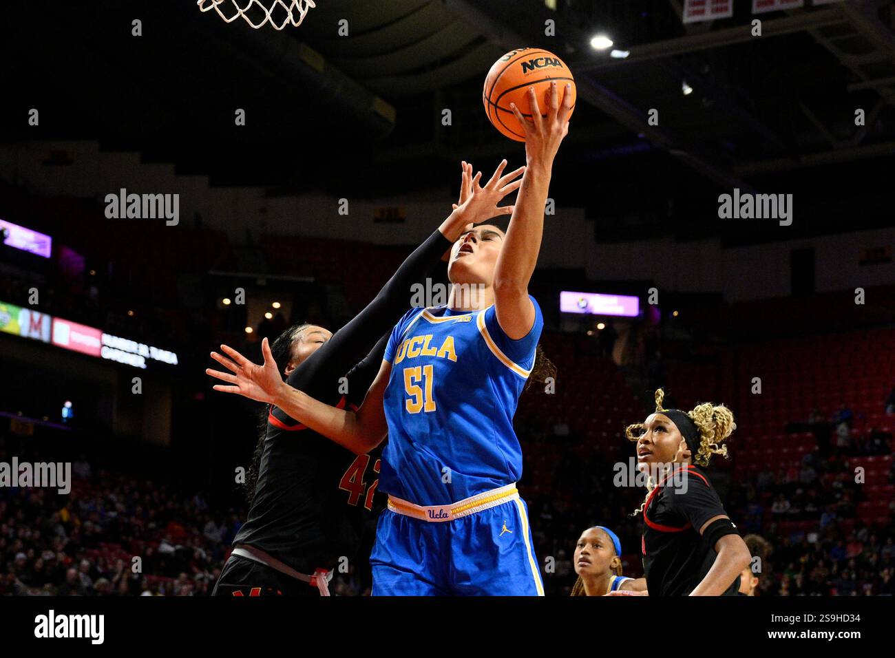 UCLA center Lauren Betts (51) goes to the basket against Maryland ...
