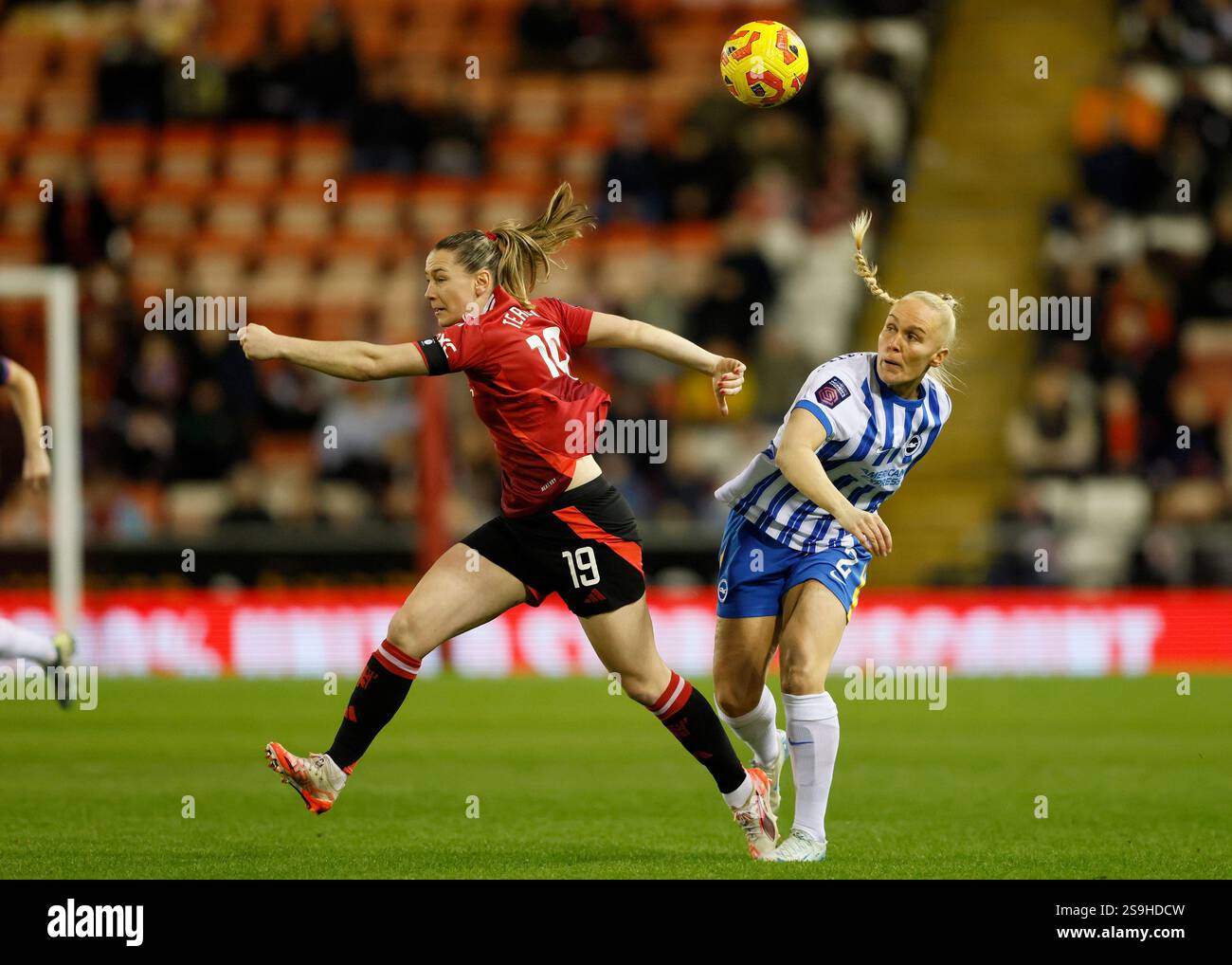 Manchester United women's Elisabeth Terland (left) and Brighton and ...