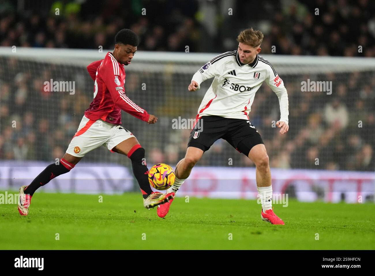 Manchester United's Amad Diallo, left, and Fulham's Emile Smith Rowe ...