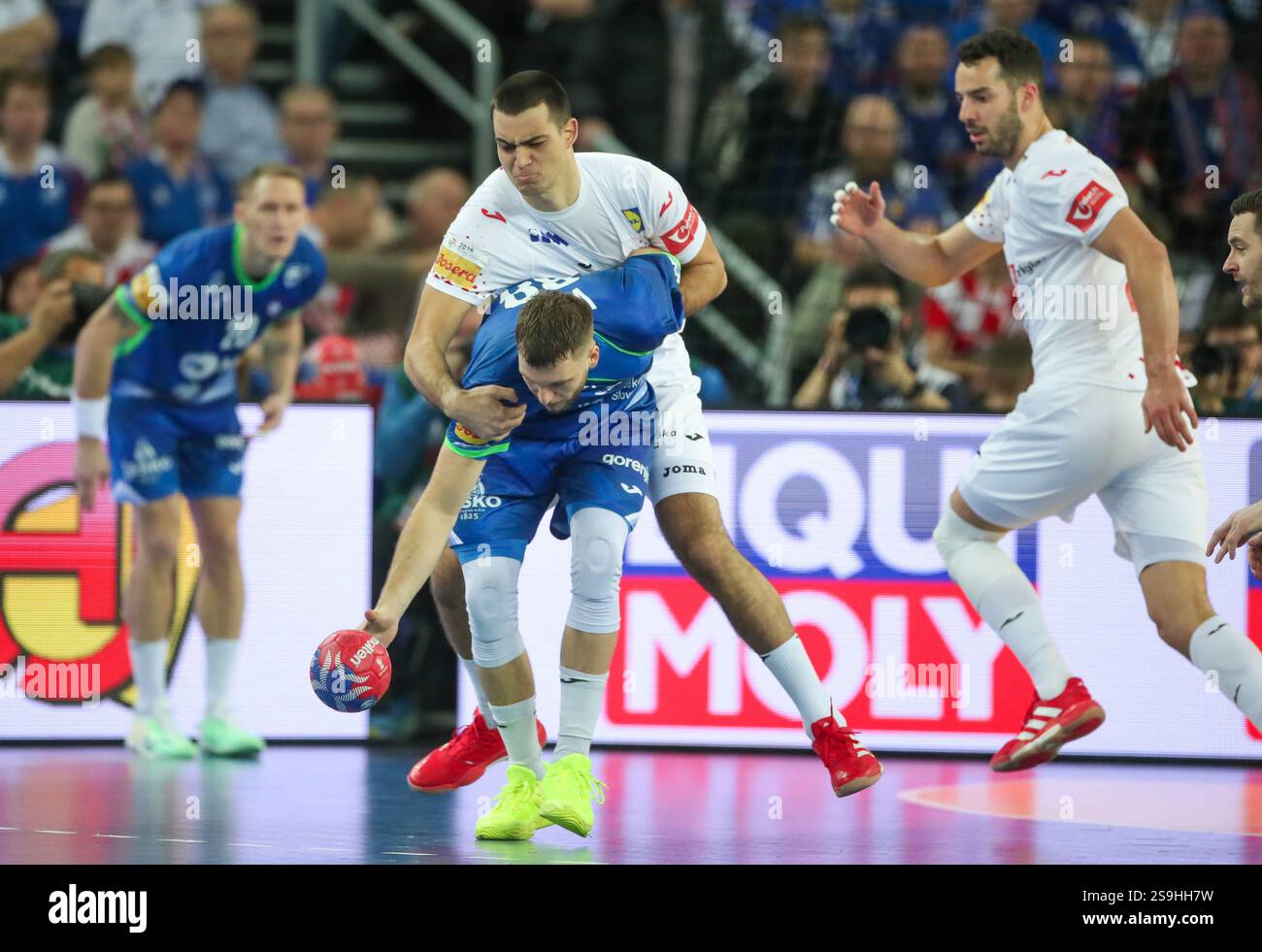 Zagreb, Croatia. 26th Jan, 2025. Aleks Vlah of Slovenia battles for the ball with Mateo Maras of ...