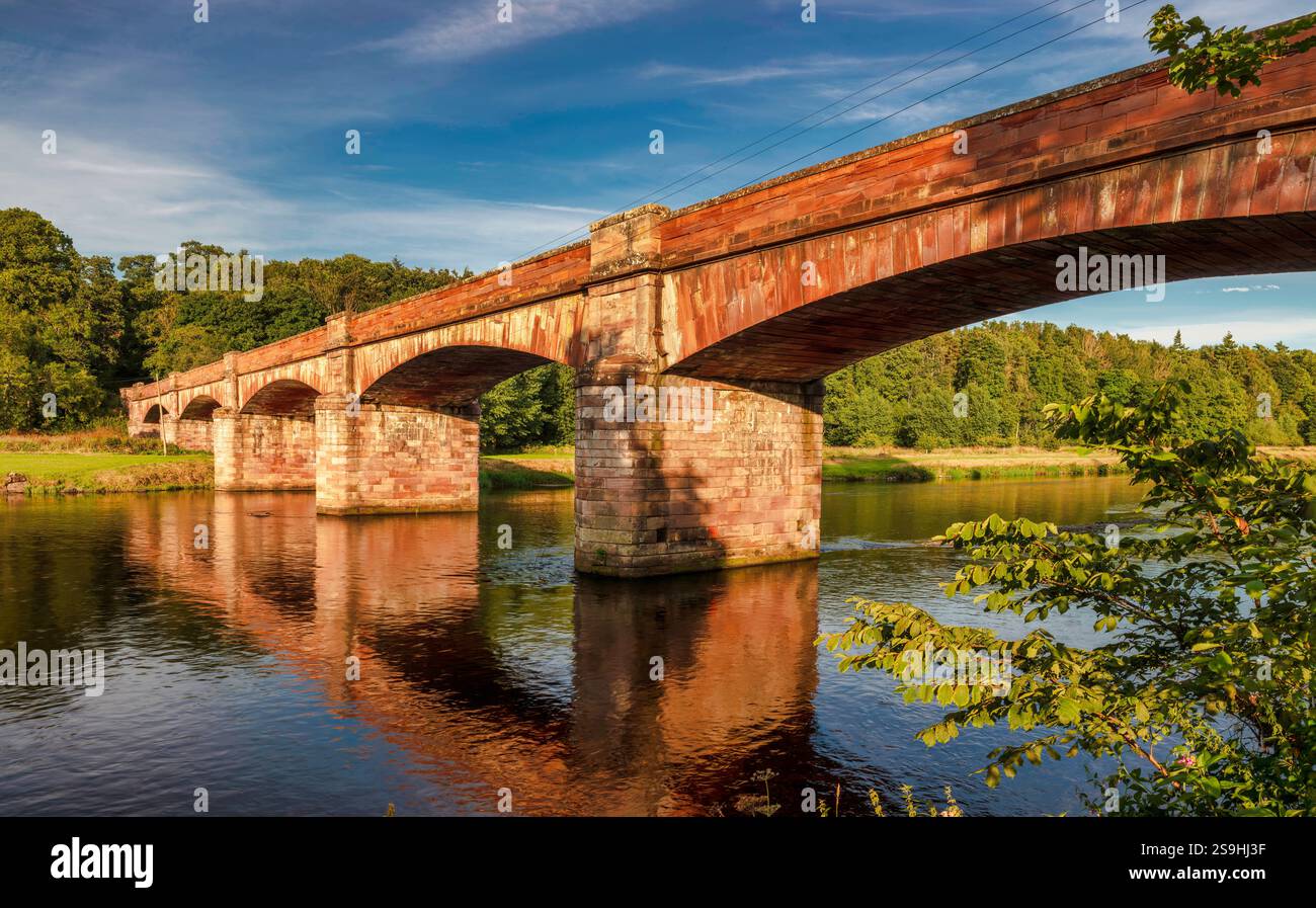 A late summer evening view of Mertoun Bridge over the River Tweed near ...