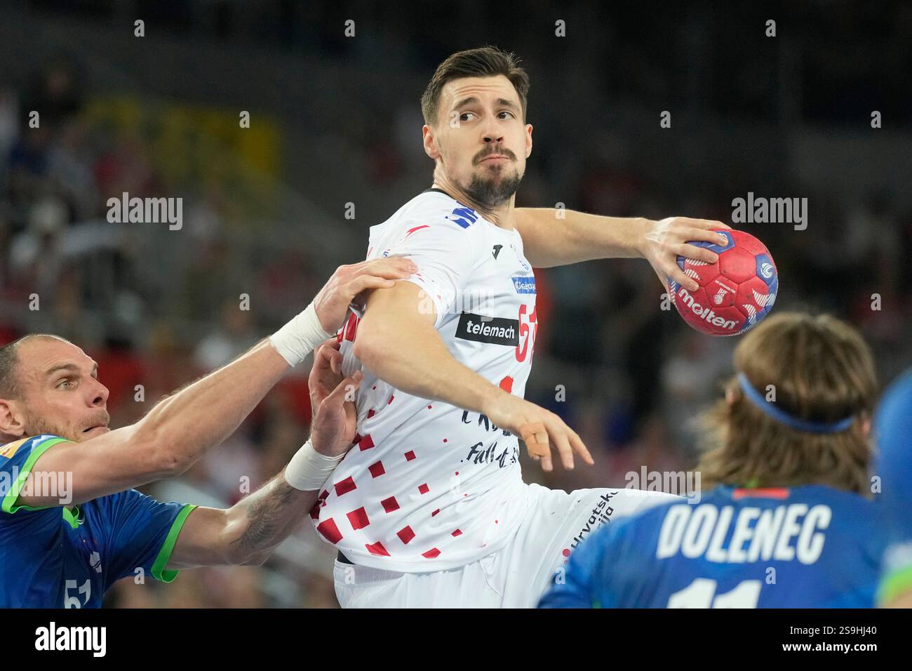Croatia's Ivan Martinovic, centre, makes a shot during the main round ...