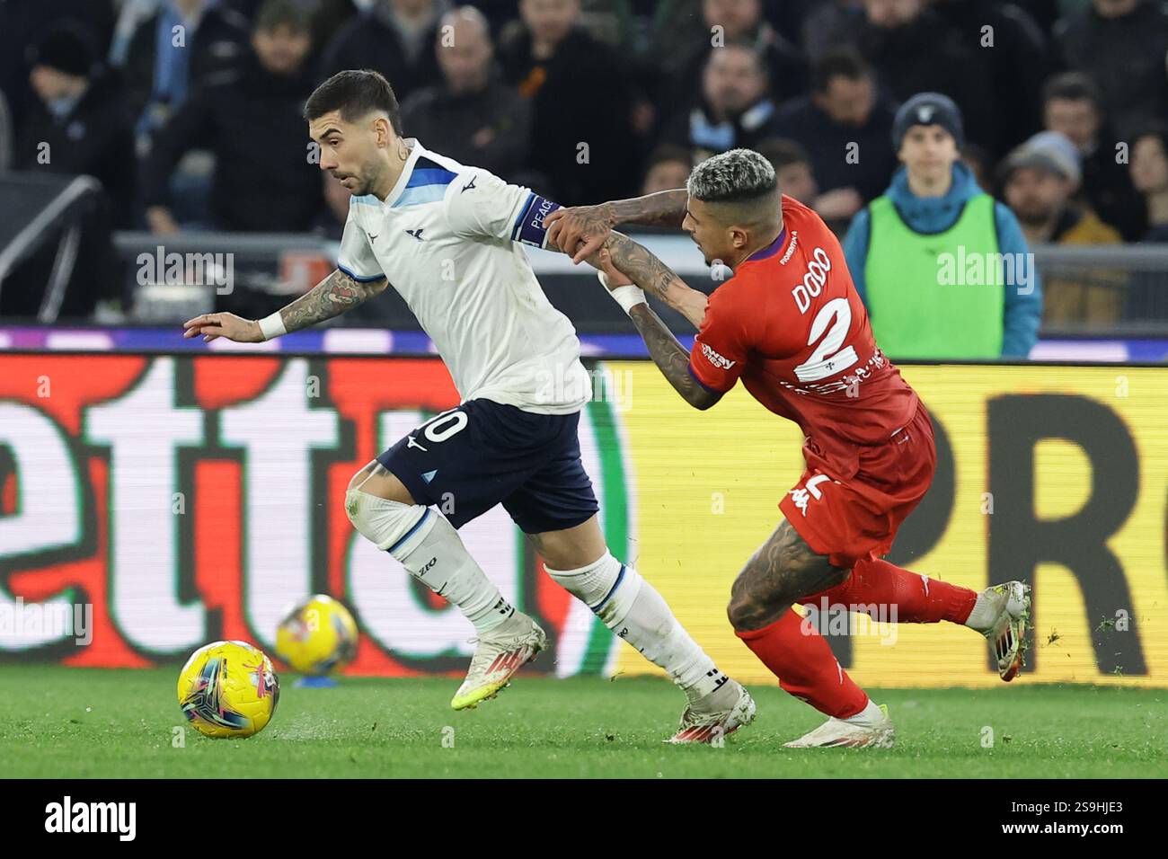 Lazioâ??s Italian midfielder Mattia Zaccagni challenges for the ball ...