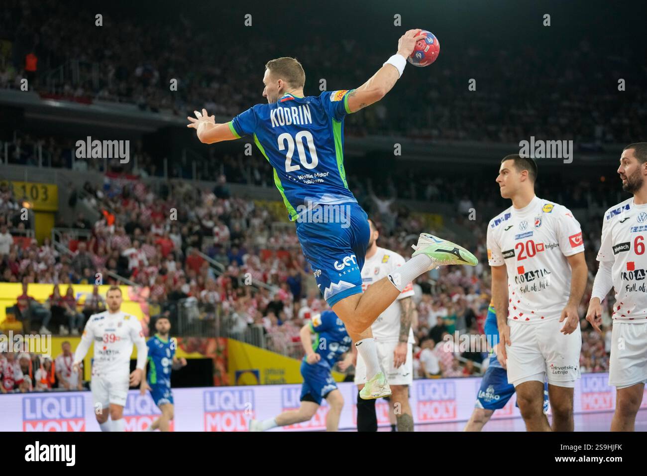 Slovenia's Tilen Kodrin makes a shot during the main round match ...