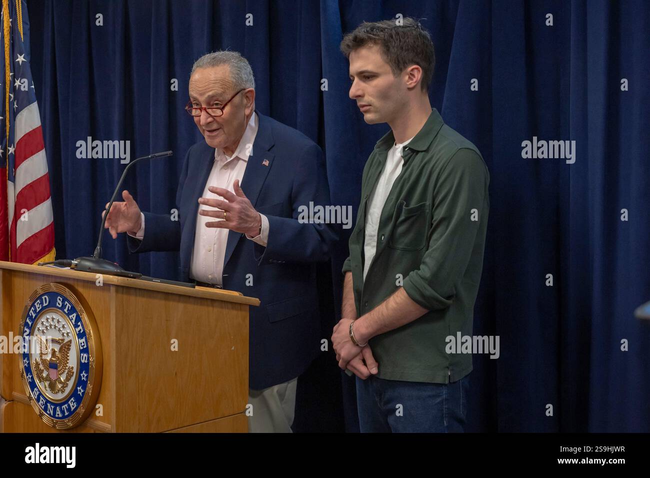U.S. Senator Chuck Schumer (D-NY) standing with Cameron Kasky, a ...