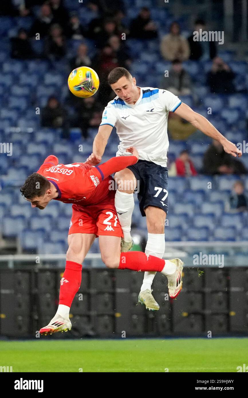 Lazio's Adam Marusic jumps for the ball with Fiorentina's Robin Gosens ...