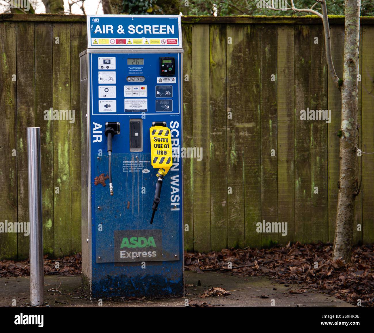 Blue air and screen wash station at ASDA Express surrounded by fallen ...