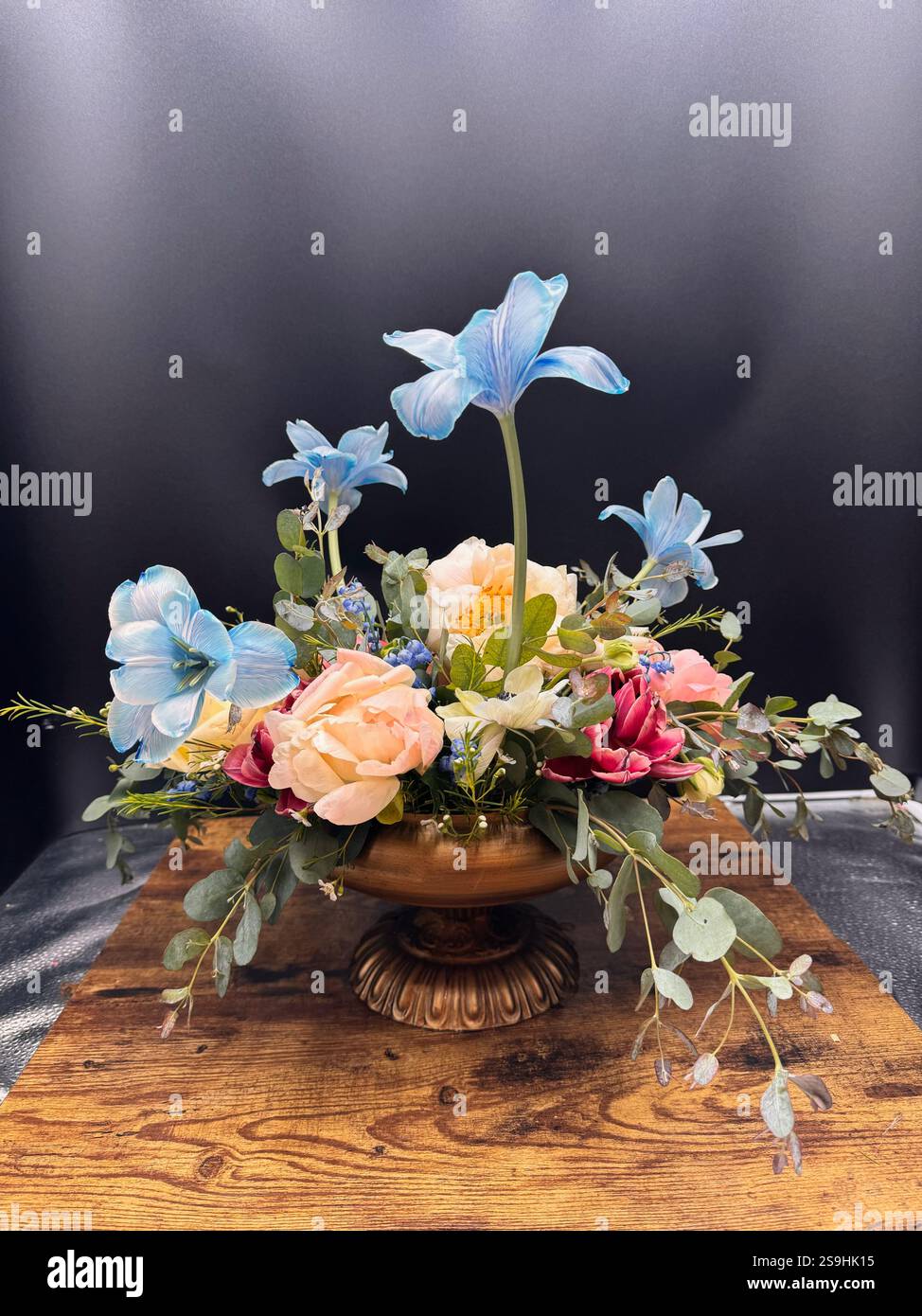 Whimsical floral arrangement captured in a show box, inspired by ...