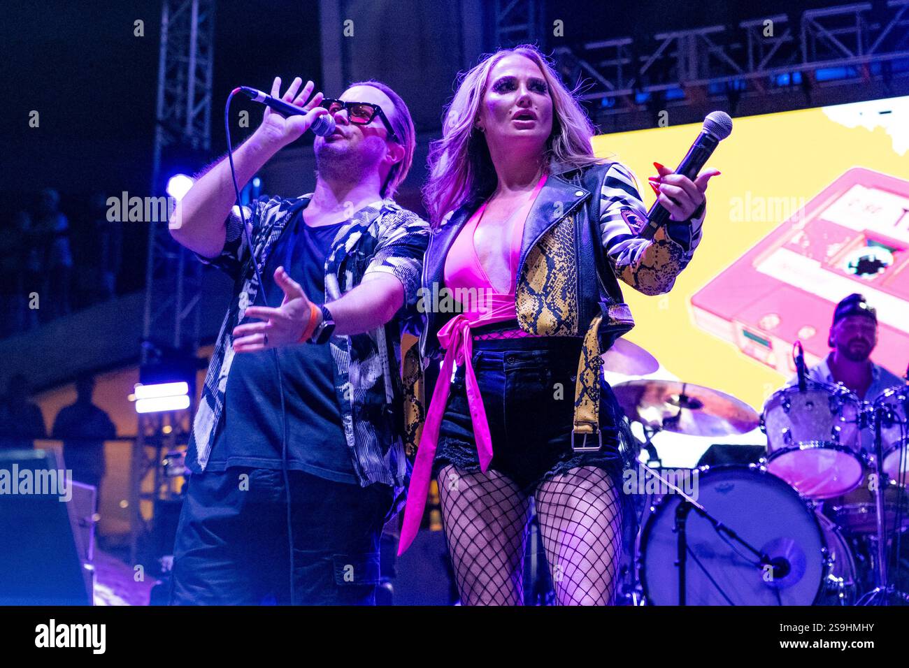 Keith Whallen, left, and Heidi Shepherd of The Stowaways perform on board the Carnival Magic ...