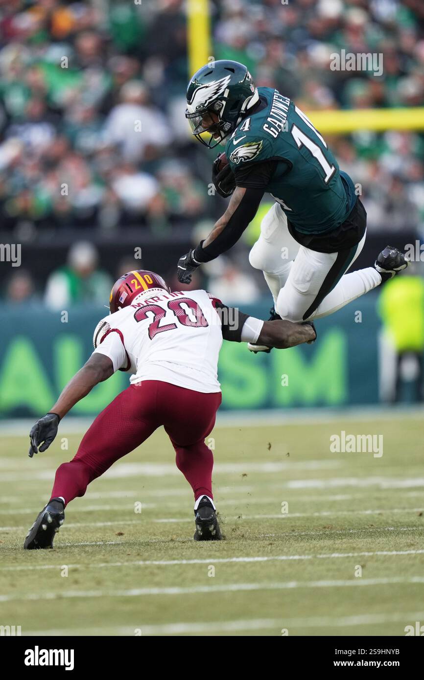 Philadelphia Eagles running back Kenneth Gainwell (14) is tackled by ...