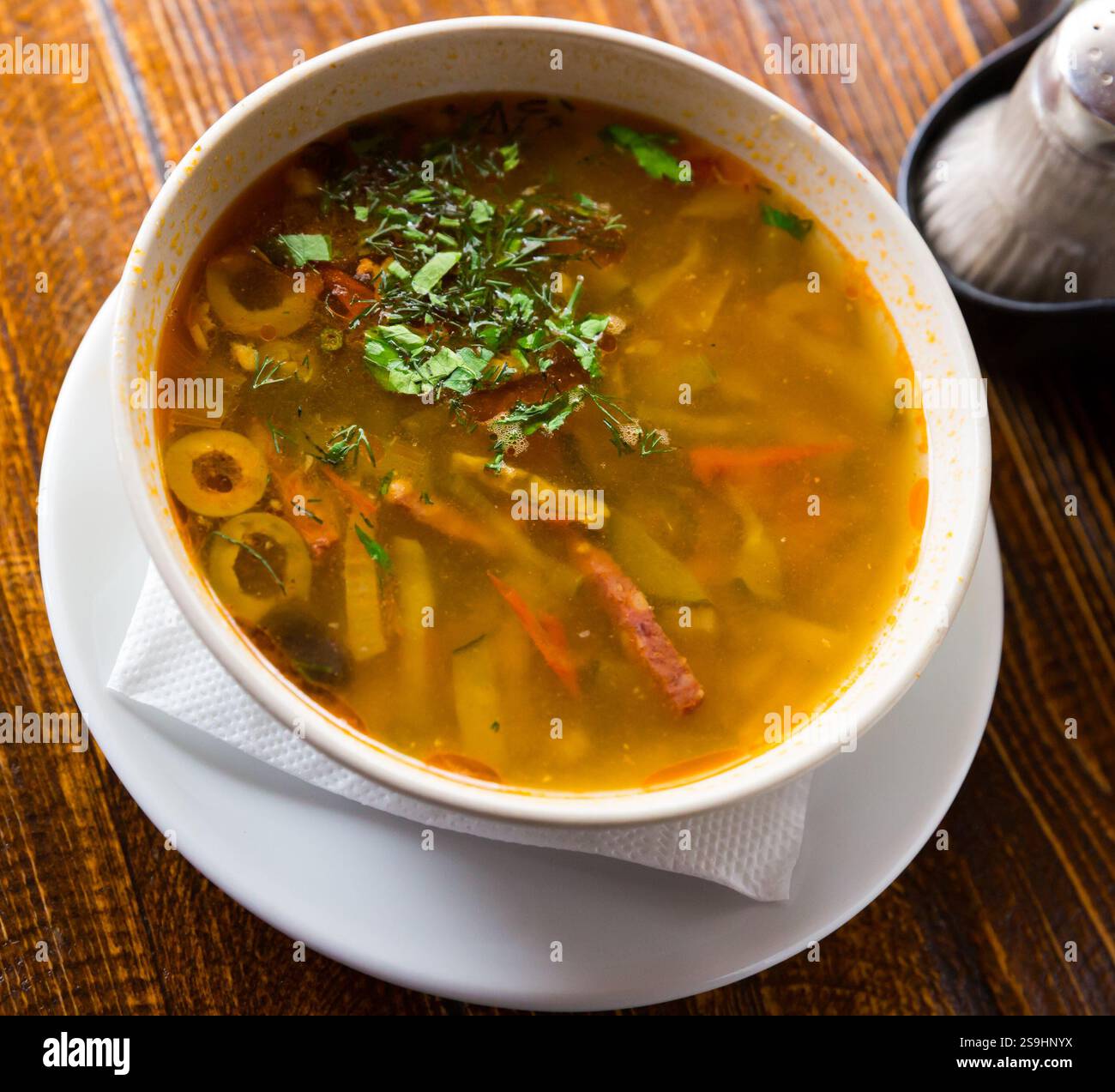 Russian cuisine - solyanka soup with various ingredients Stock Photo ...
