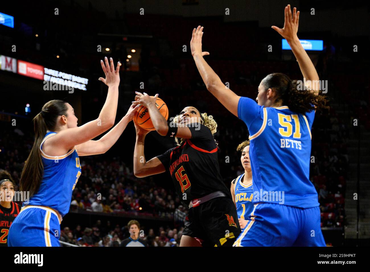 Maryland forward Christina Dalce (15) is fouled by UCLA forward Angela ...