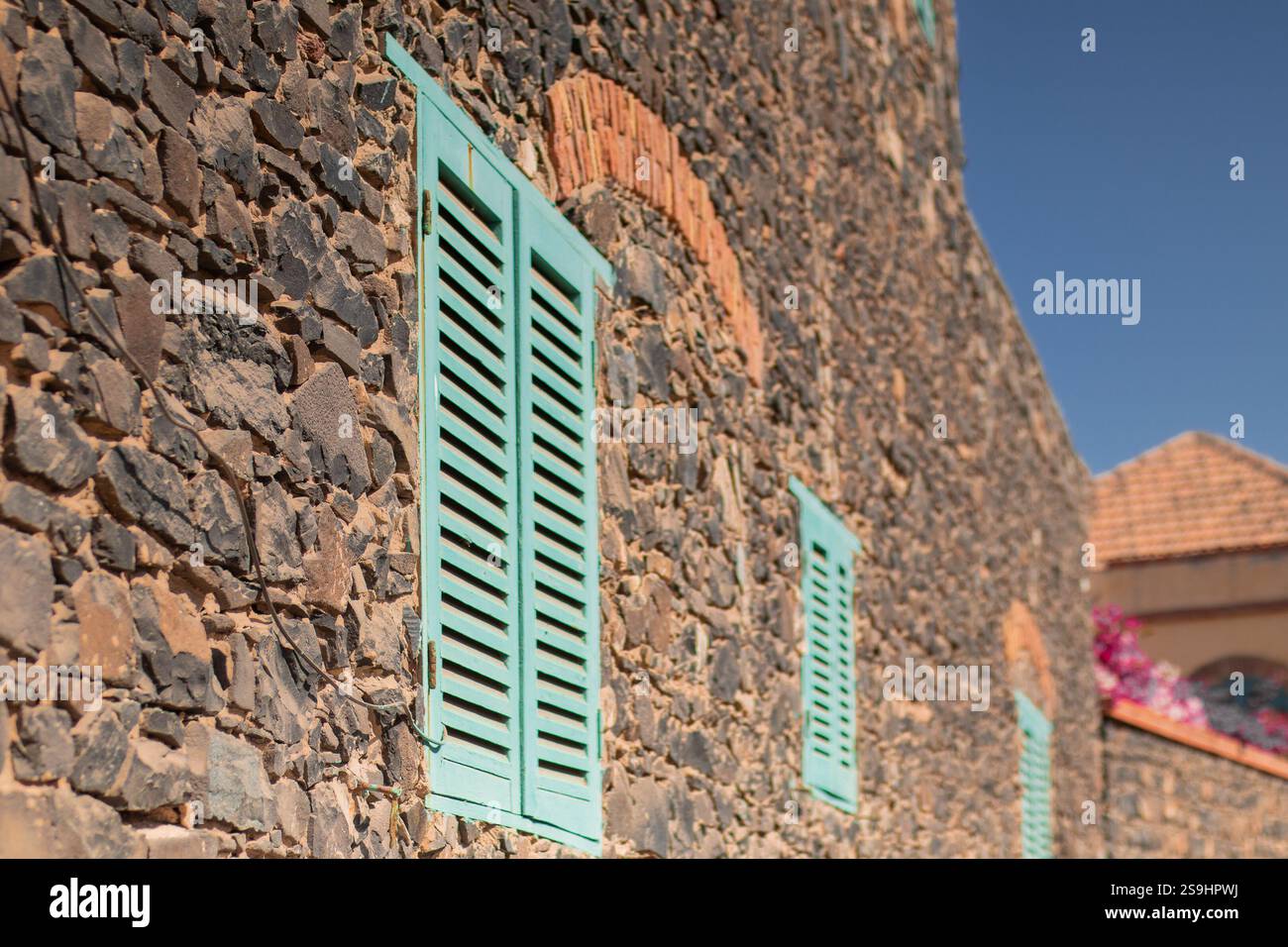 Wooden window blinds on the outside of the house on ilee de goree ...