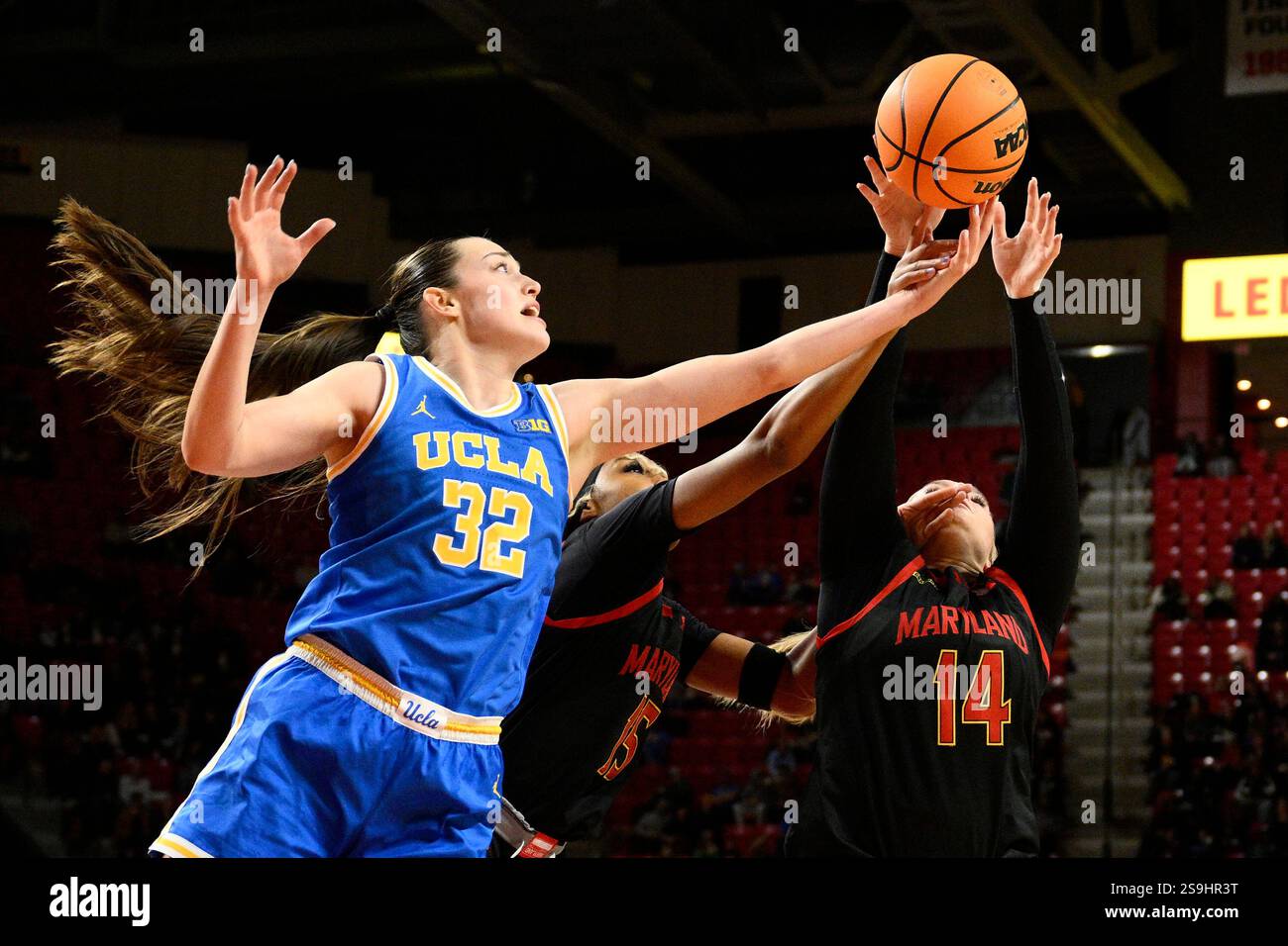 UCLA forward Angela Dugalic (32) battle for the ball against Maryland ...
