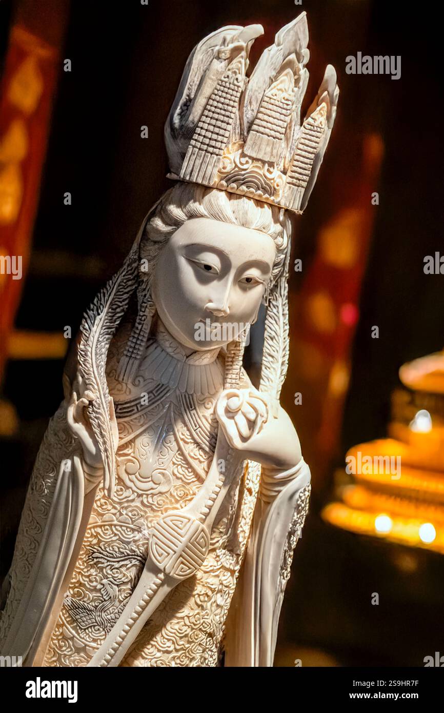 Chinese carved ivory Guan Yen statue with headdress in the interior of ...