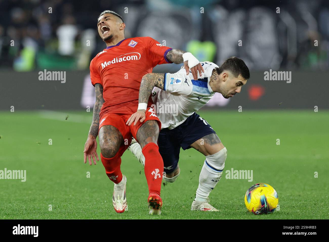 Fiorentina's Brazilian defender Dodo challenges for the ball with ...