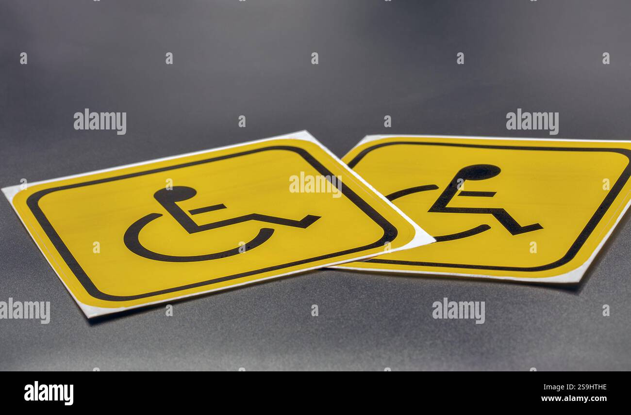 Studio shoot of yellow disability sign for placement on a vehicle ...