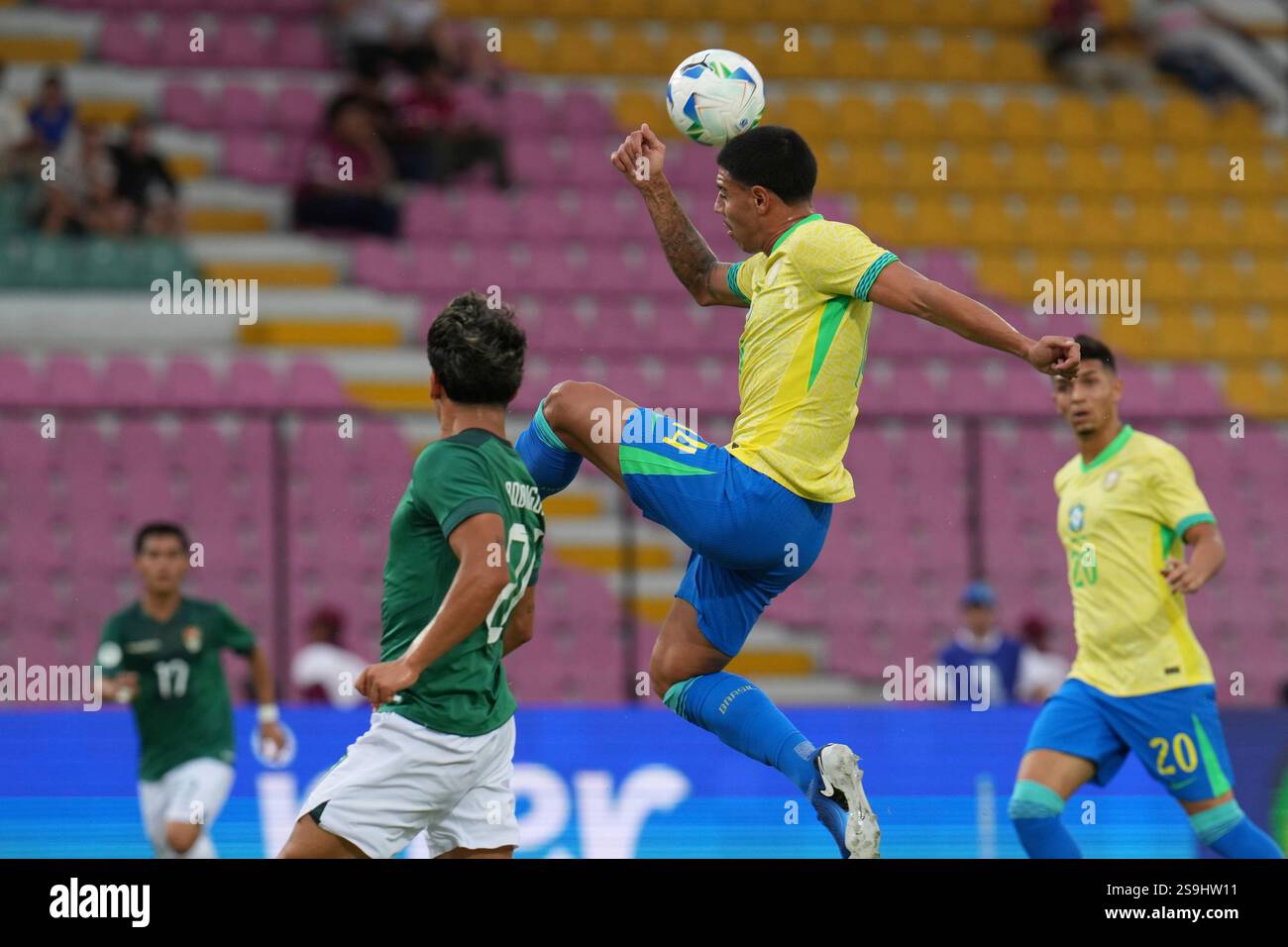 Brazil S Wesley Ribeiro Heads The Ball Under Pressure From Bolivia S