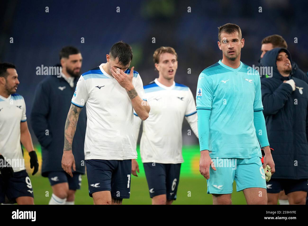 Lazio's Alessio Romagnoli, left, and goalkeeper Ivan Provedel leave the ...