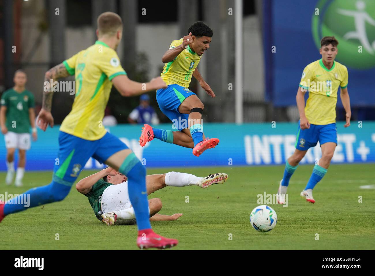 Brazil's Kauan Rodrigues jumps over Bolivia's Oscar Lopez during a ...