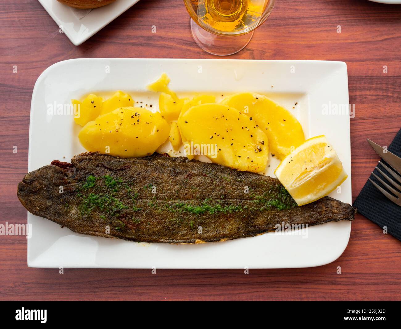 Lenguado fish (sea tongue or European salt) baked served with stewed ...
