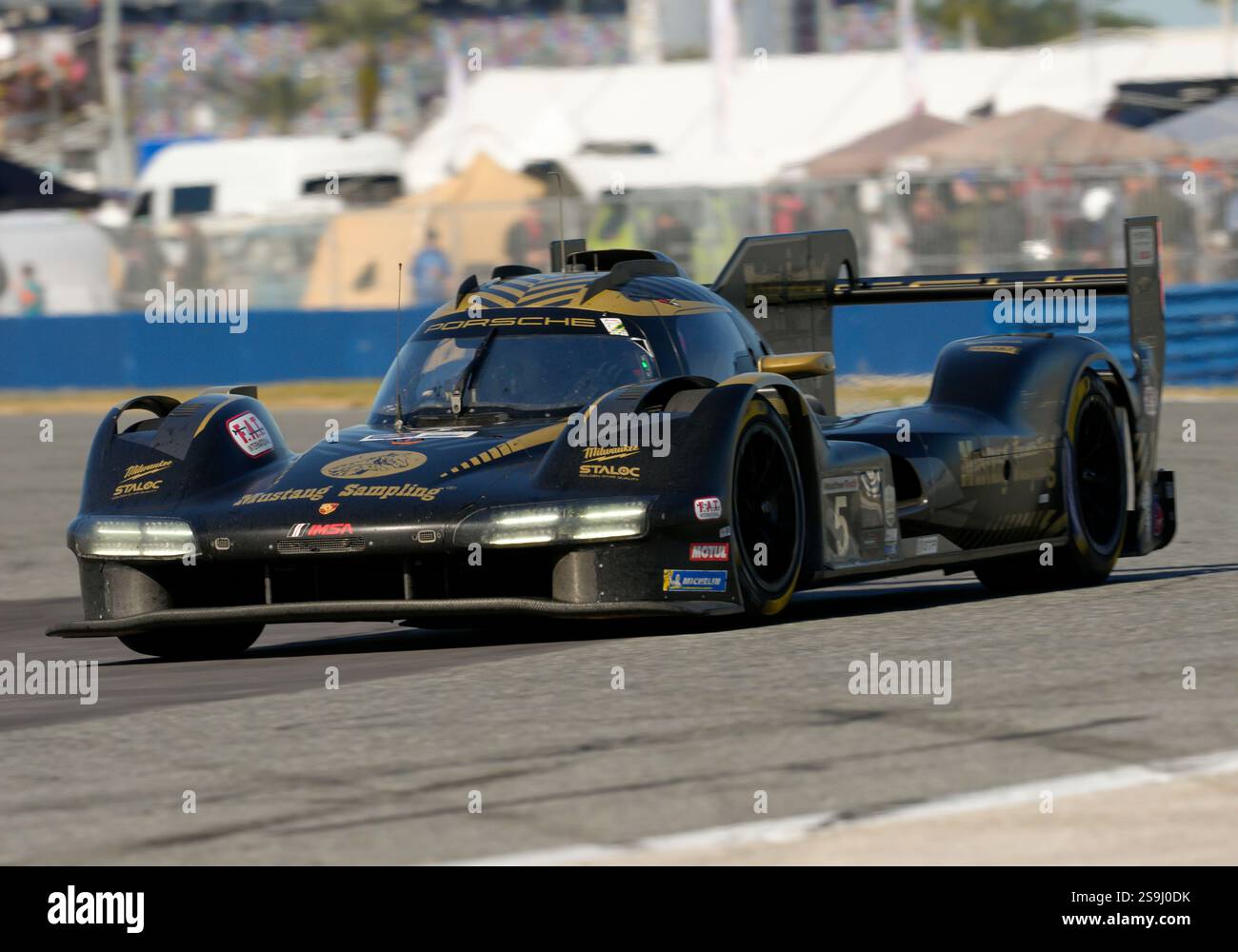 DAYTONA BEACH, FL - JANUARY 25: (5) GTP Driver Gianmaria Bruni, Neel ...