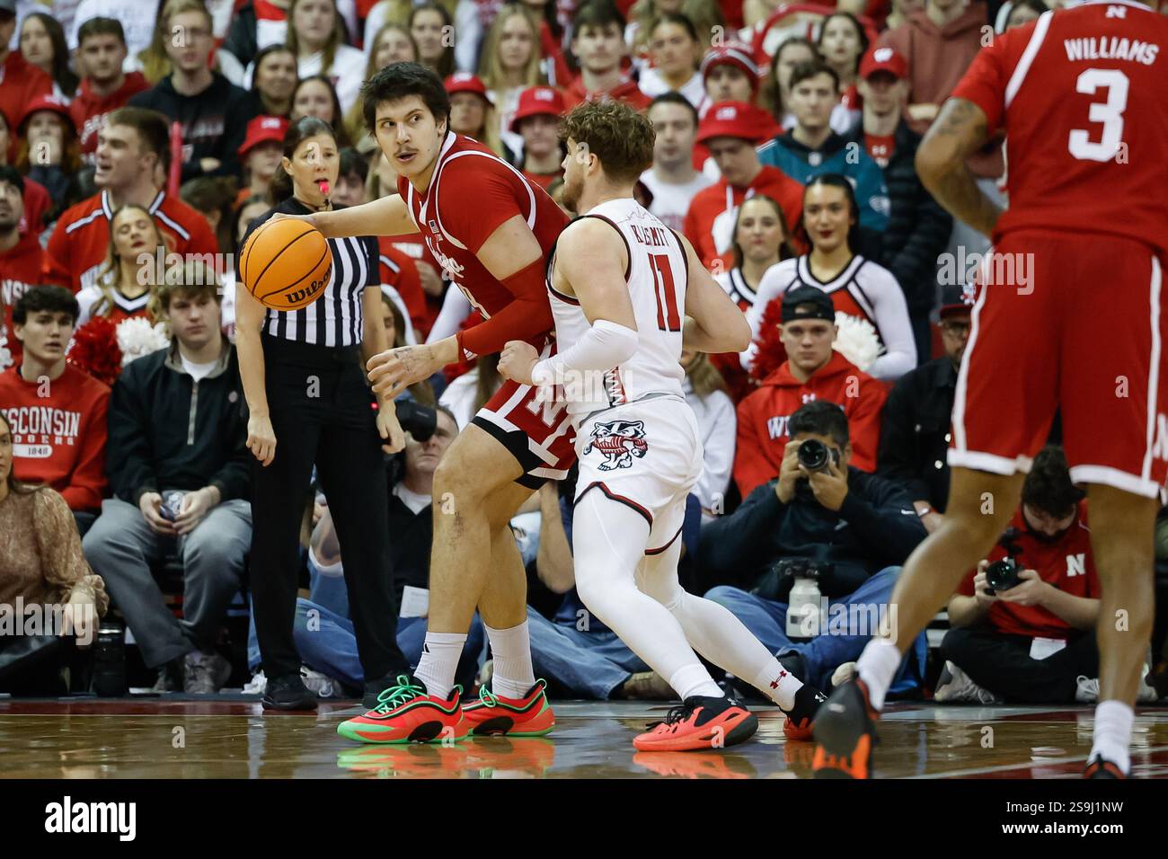 January 26, 2025: Wisconsin Badgers guard Max Klesmit (11) defends ...