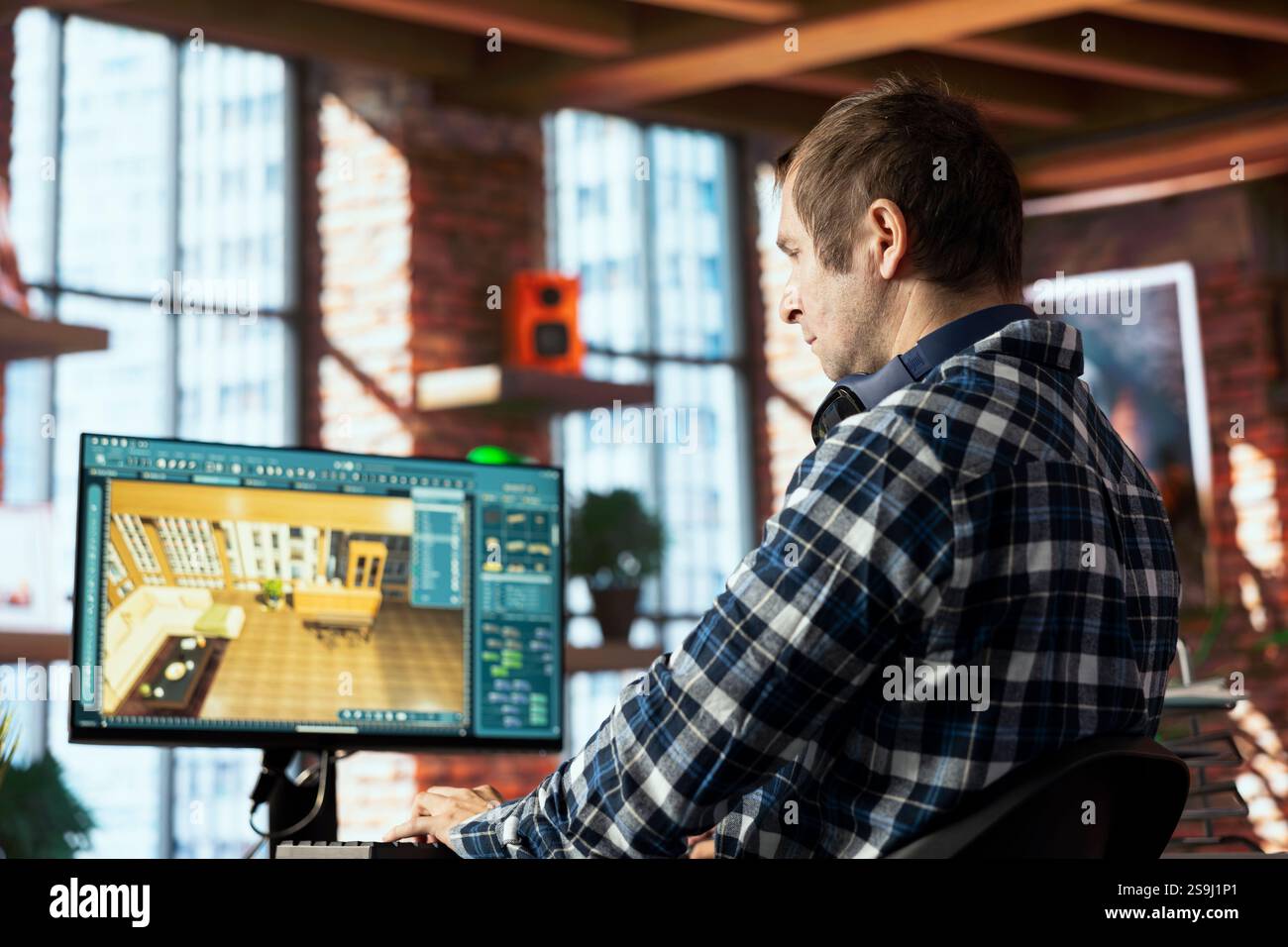 Interior designer operating 3D modeling application, importing ...