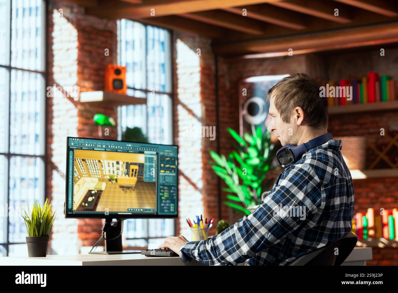 Interior designer working from home uses architectural app on computer ...