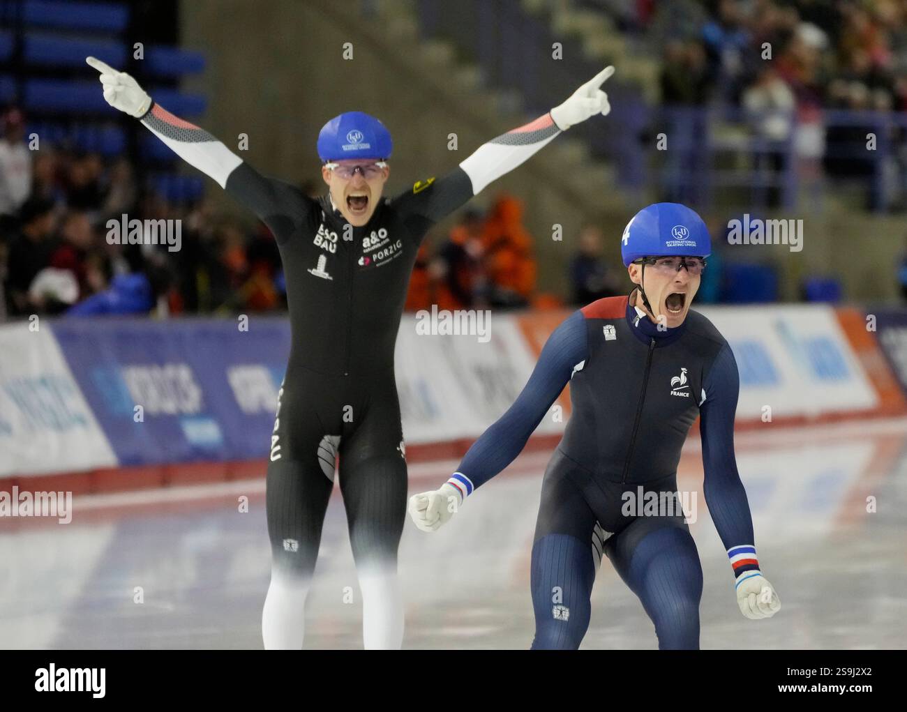 French speed skater Timothy Loubineaud, right, reacts after finishing ...