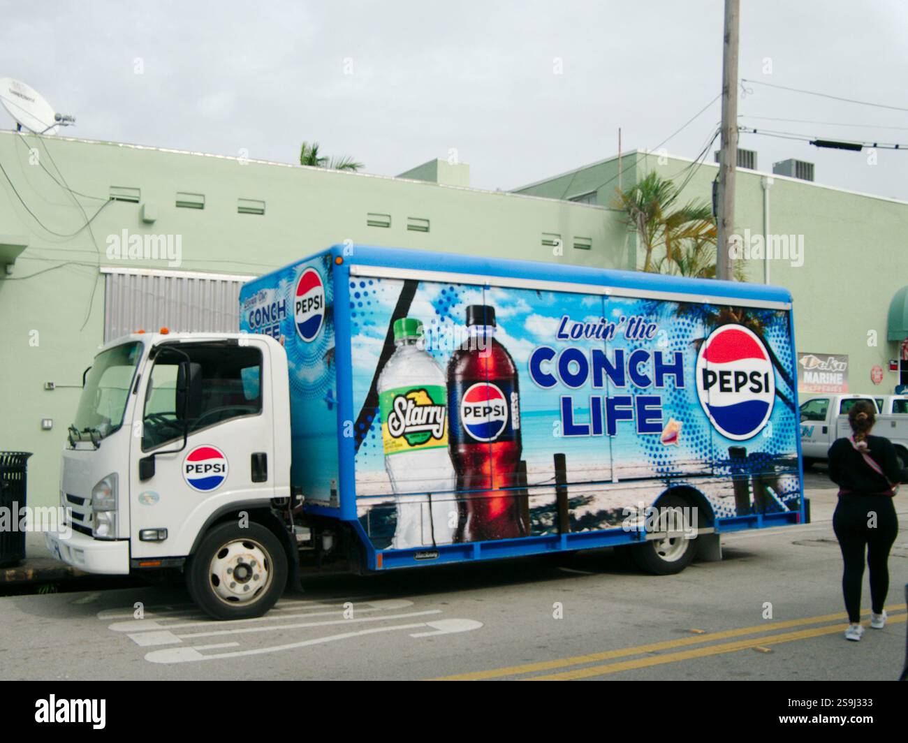 Side view of a Pepsi Cola red, blue and white delivery truck. Living ...