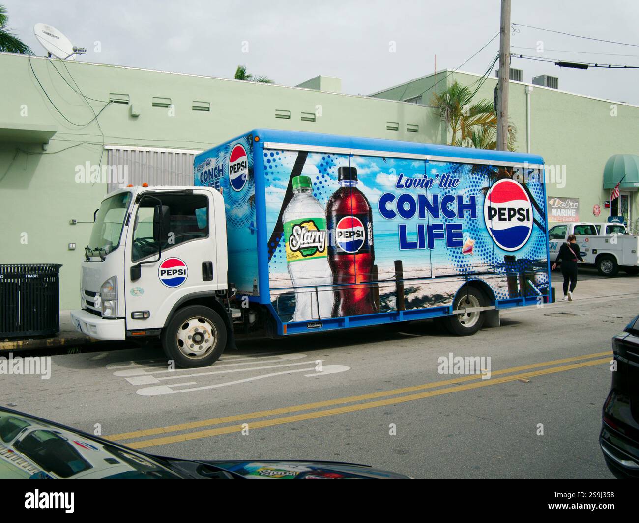 Side view of a Pepsi Cola red, blue and white delivery truck. Living ...