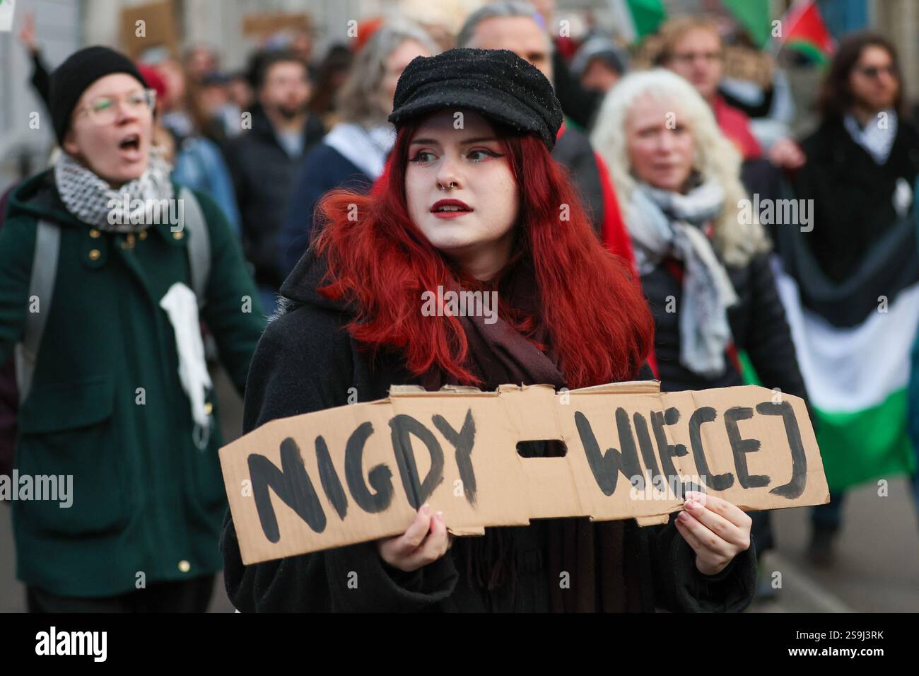 A Pro-Palestinian protester marches with a placard expressing her ...