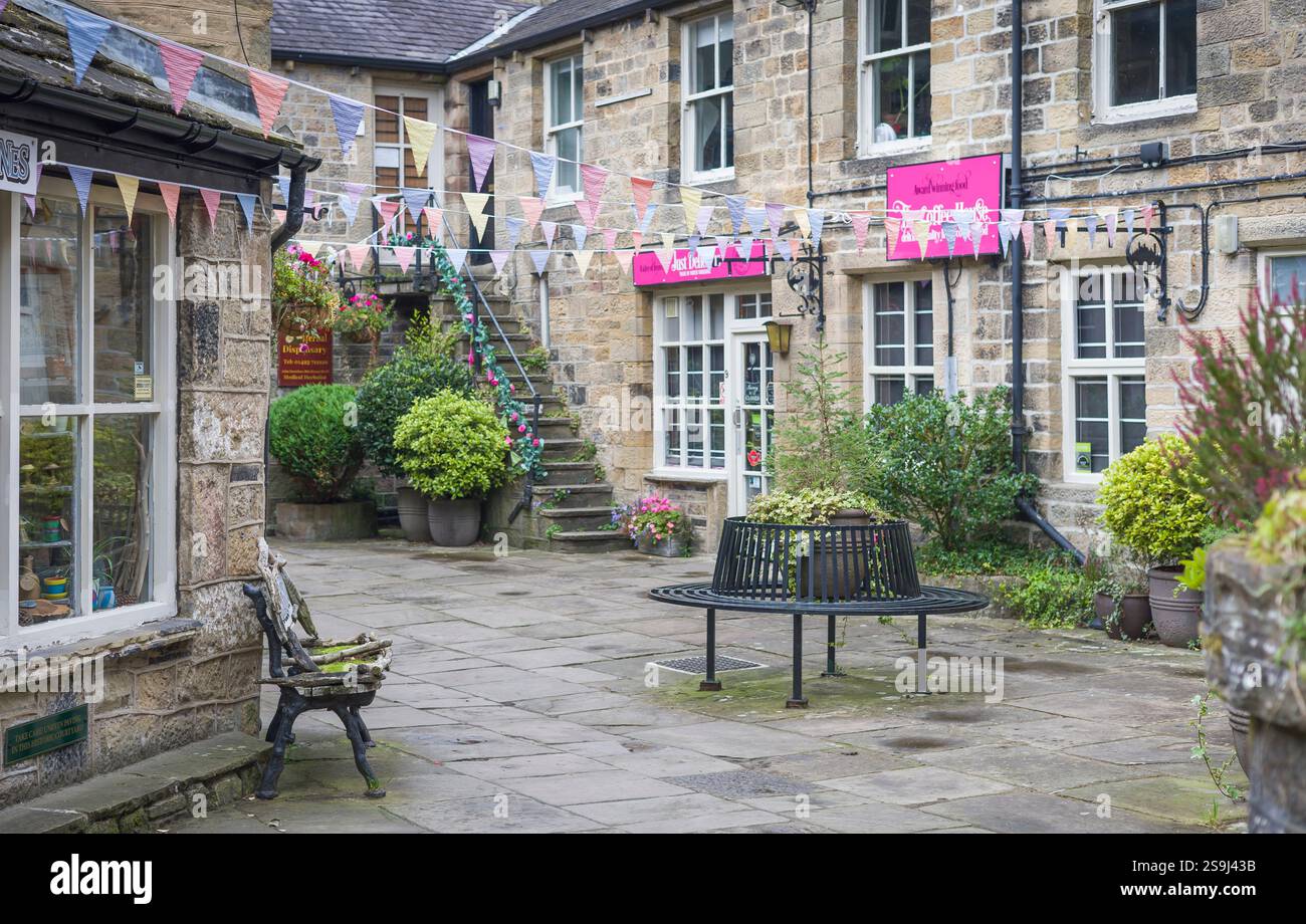 Pateley Bridge, UK - September 15, 2024. Old buildings with shops in ...