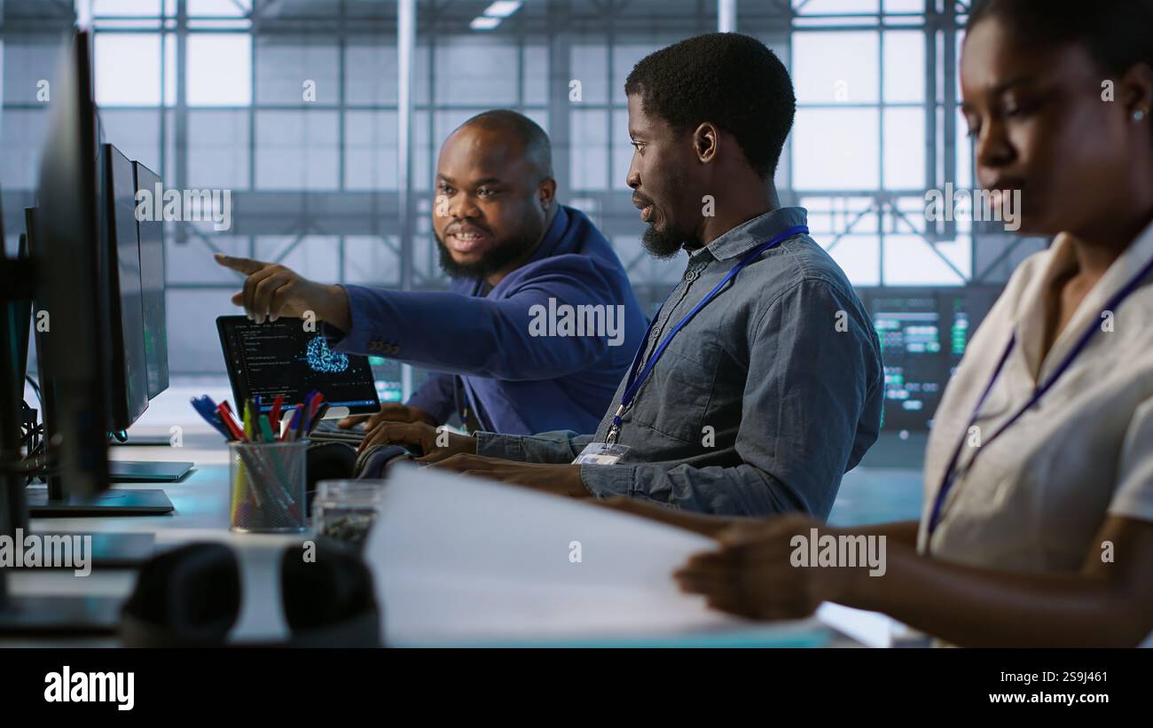 Data center engineers maintaining hi-res stock photography and images ...