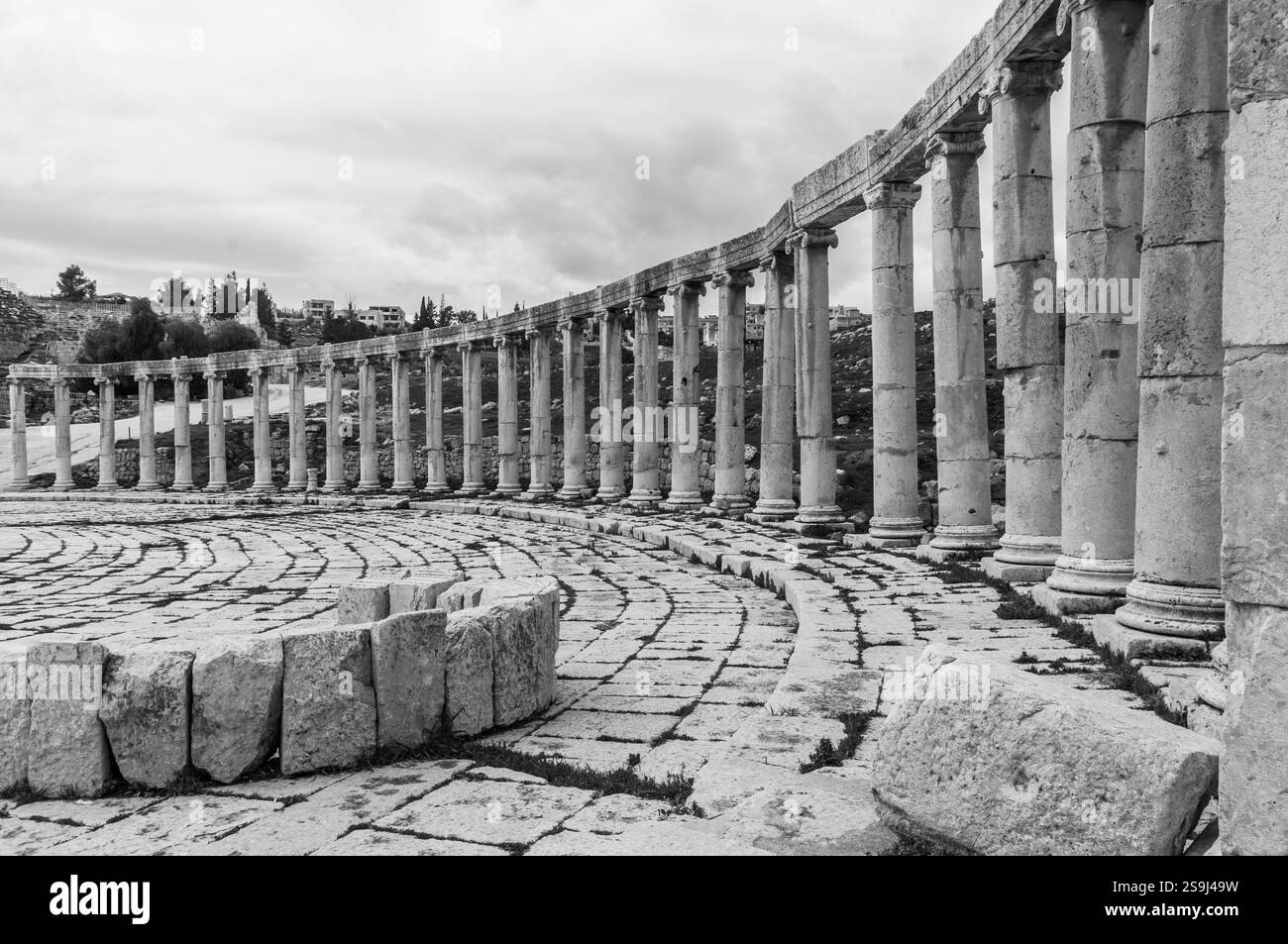 A large stone archway with pillars and a stone circle in the middle ...