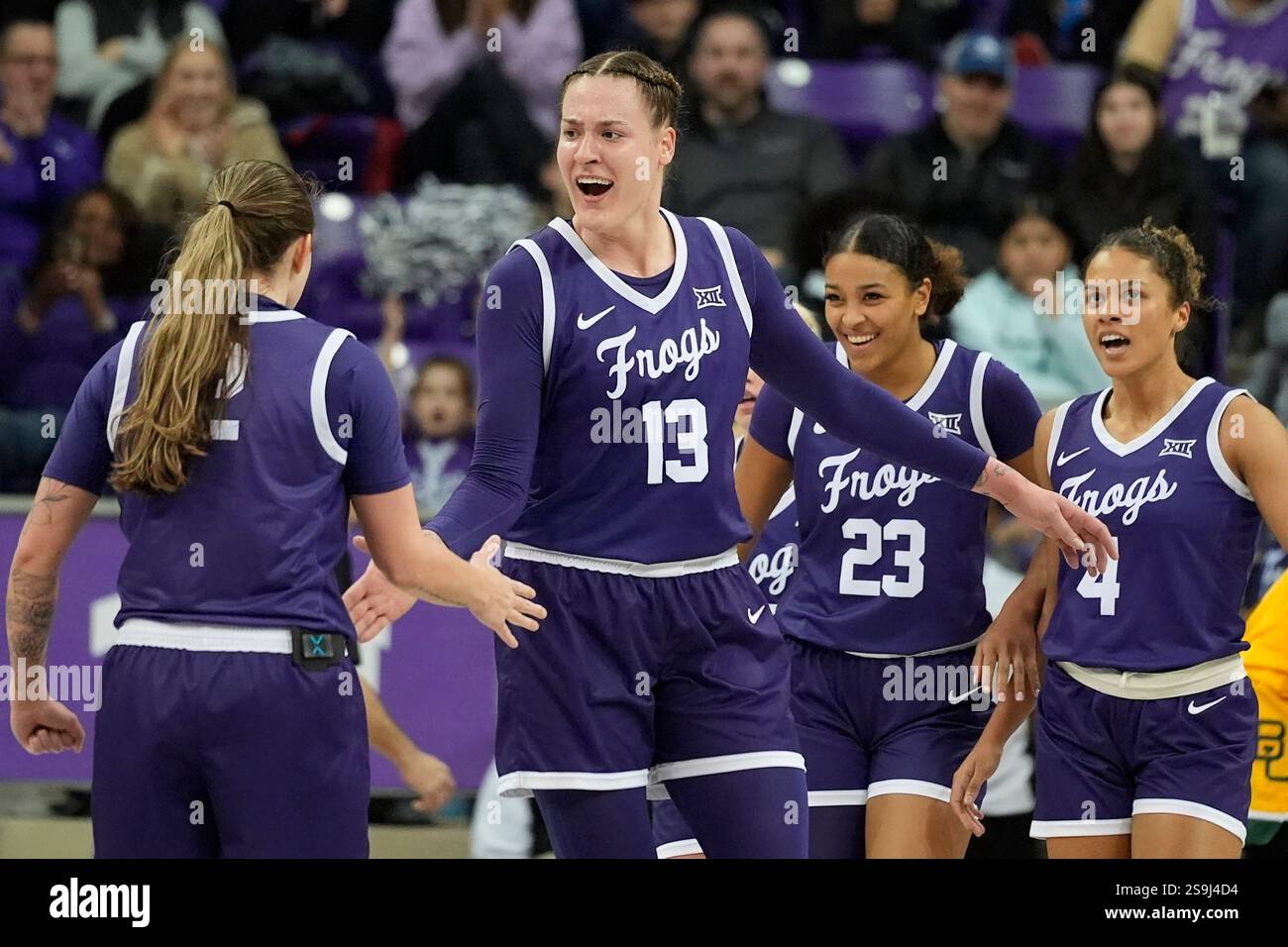 TCU center Sedona Prince (13) celebrates with teammates after scoring a ...