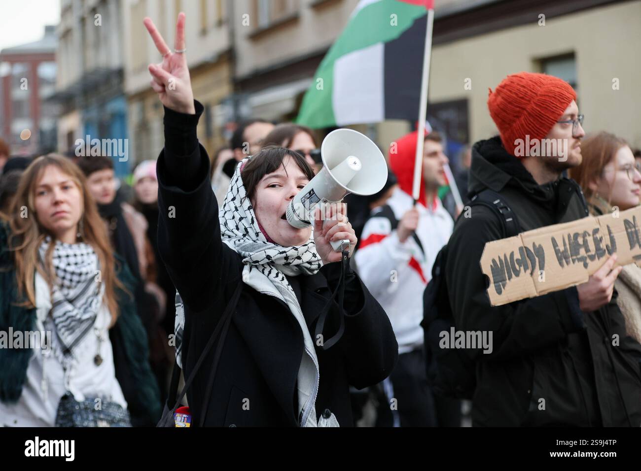 A Pro-Palestinian protester chants through a megaphone during the ...