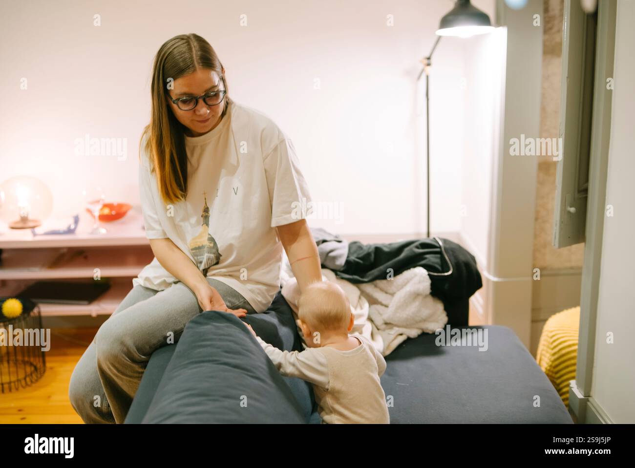 Candid Moment A Precious Parent and Infant Bonding Experience Happening at Home Together Stock ...