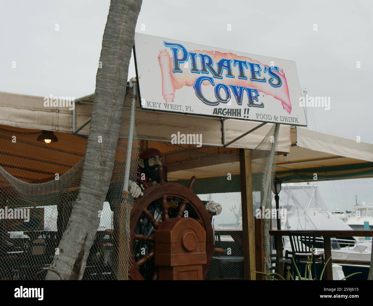 Sign for Pirate's Cove Restaurant Located in Key West's Historic ...