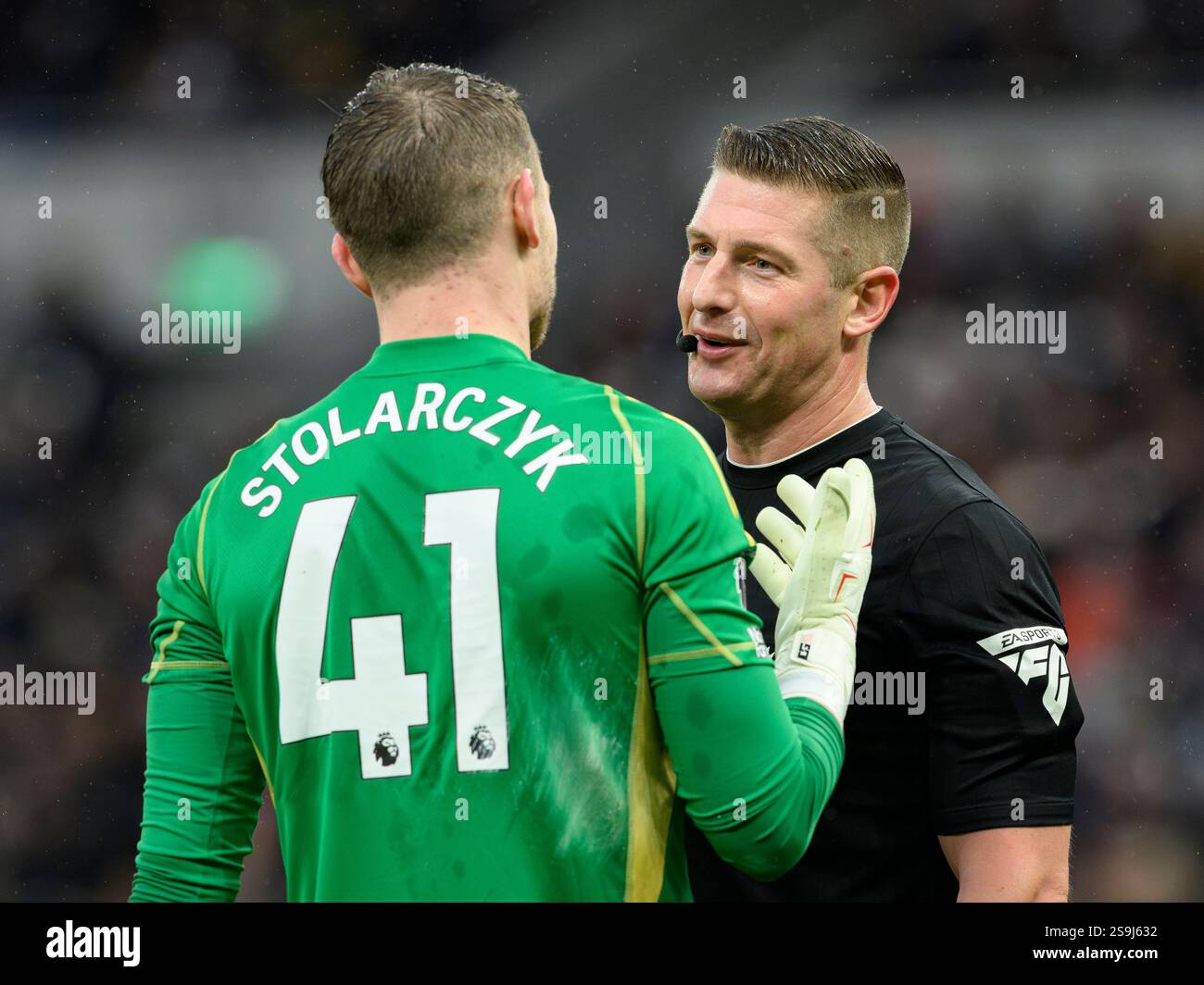 London, England - 2025 January 26th: Referee Robert Jones (right) in ...