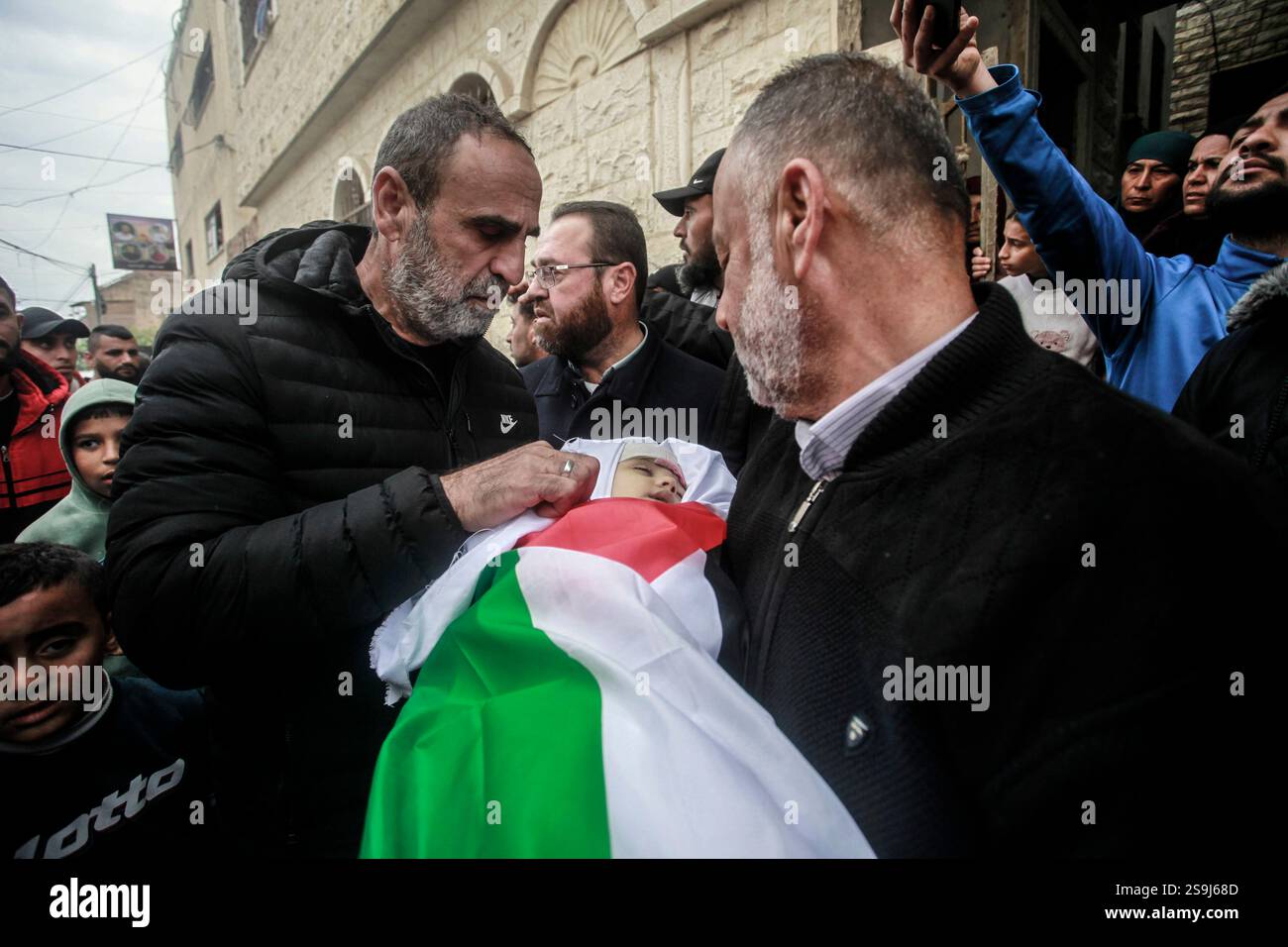 (EDITORS NOTE: Image depicts death)Palestinians and relatives of the ...