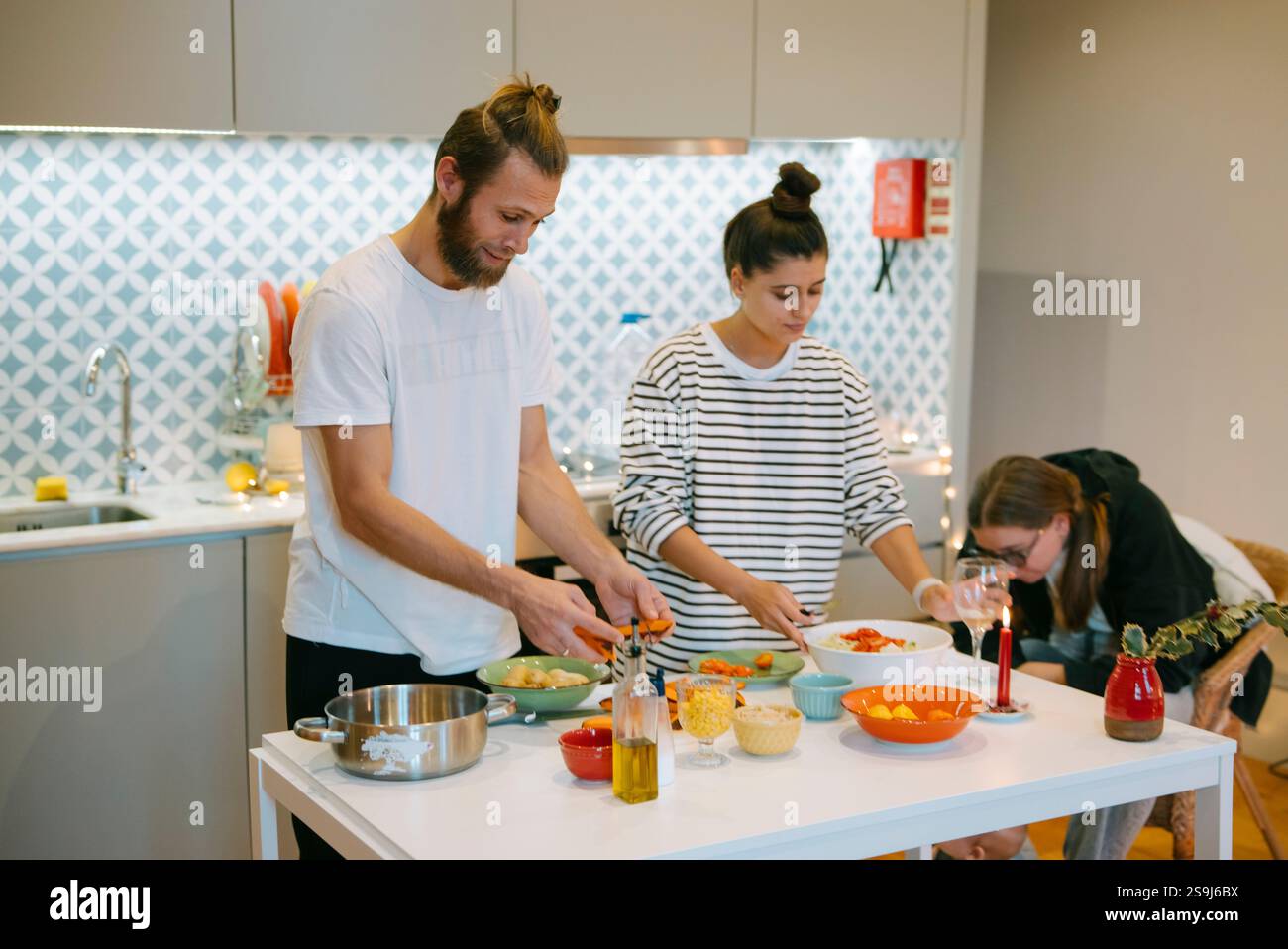 Engaging in Group Cooking Activities Together in a Vibrant and Modern ...