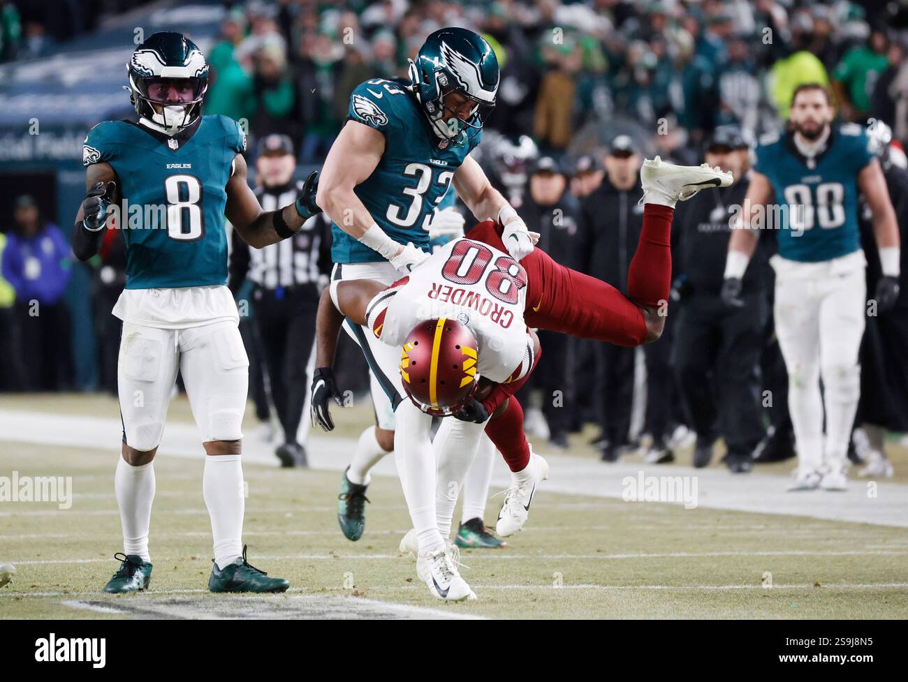 Washington Commanders wide receiver Jamison Crowder (80) is tackled by ...