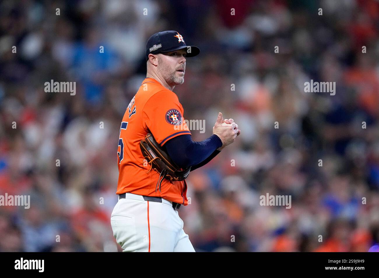 FILE - Houston Astros relief pitcher Ryan Pressly walks back onto the mound after throwing a ...