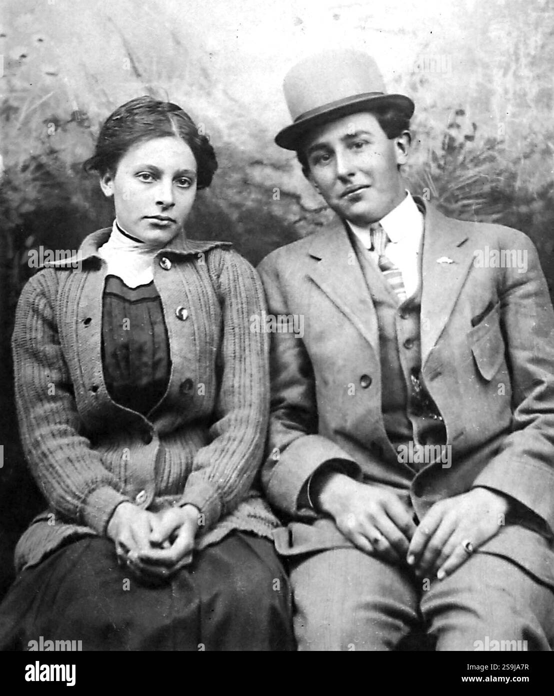 An attractive young couple pose for a studio portrait, ca. 1890s Stock ...