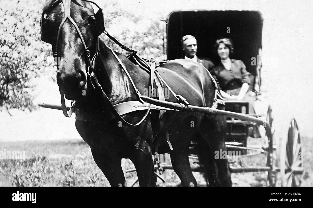 A young couple out for ride in their horse drawn buggy, ca. 1900 Stock ...