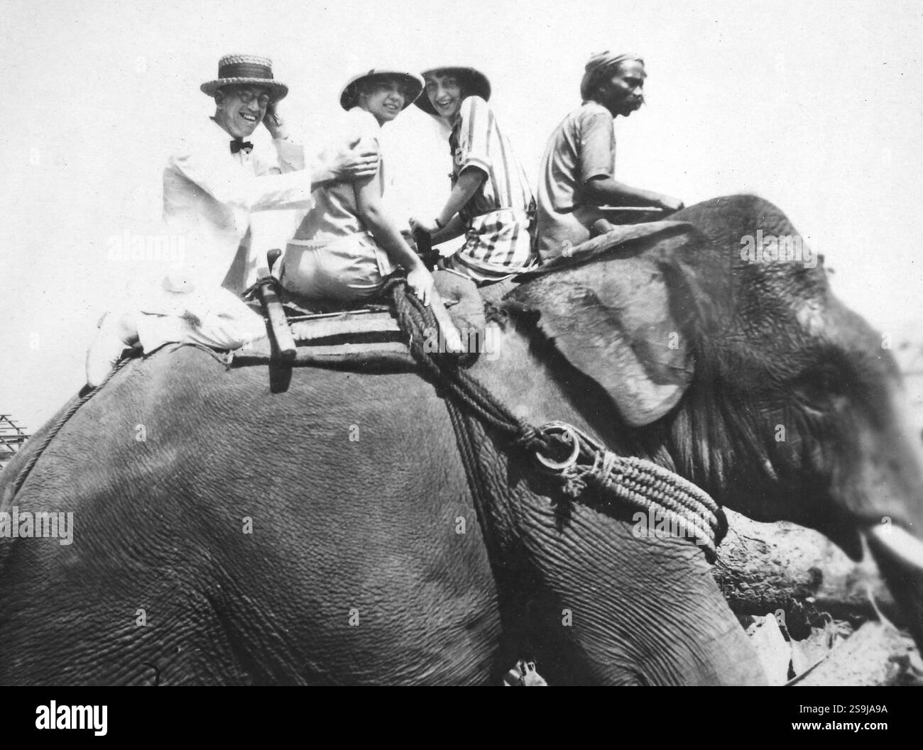 American tourists ride an Indian elephant, ca. 1925 Stock Photo - Alamy
