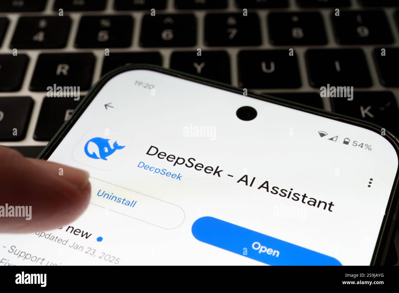 DeepSeek AI Assistant app seen on the smartphone screen in Google app store with Uninstall and ...